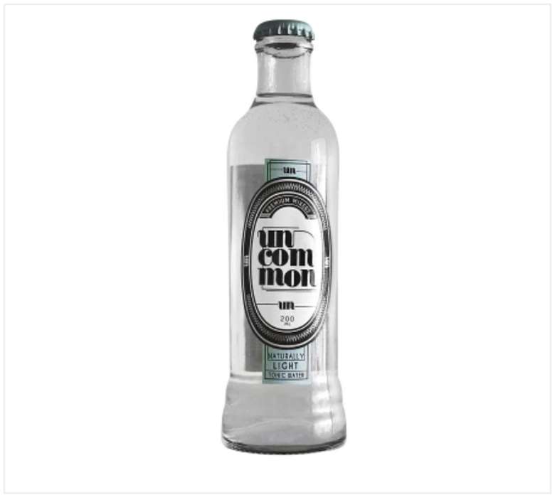 Booz.cl: Agua Tónica Uncommon Naturally Light 200cc